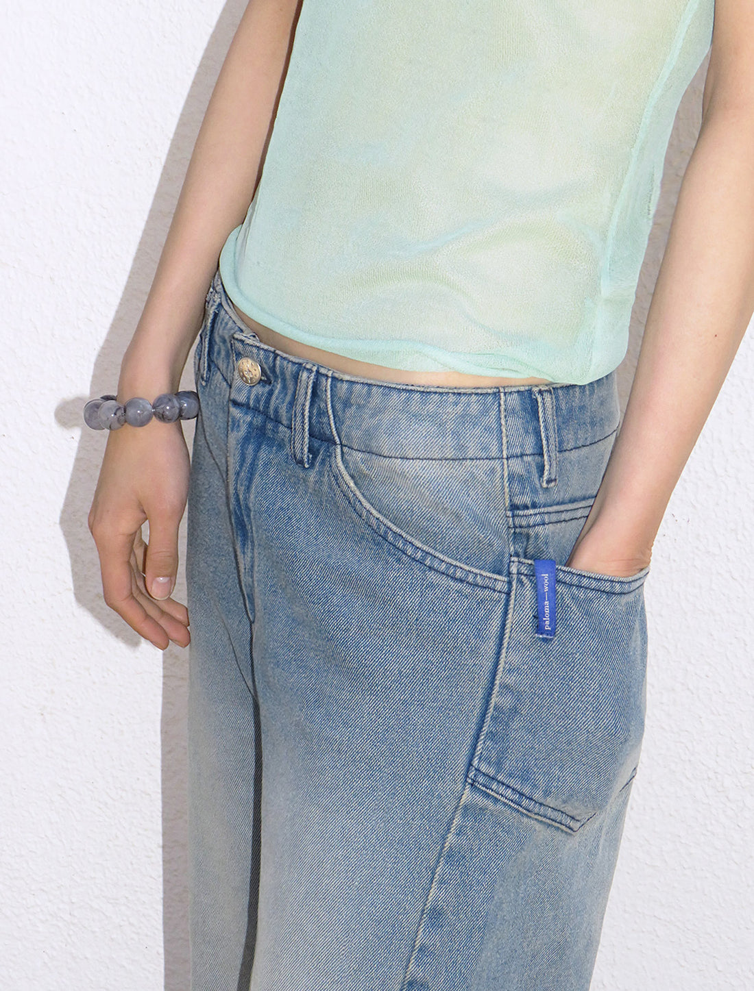 ULSAN-Relaxed fit, washed denim pants with forward seams and offset ...