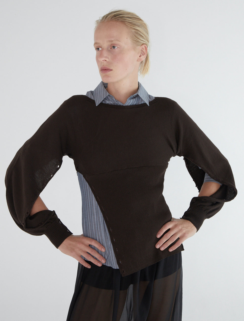 FA-Flat cross-shaped top with buttons along the sides and sleeves for ...