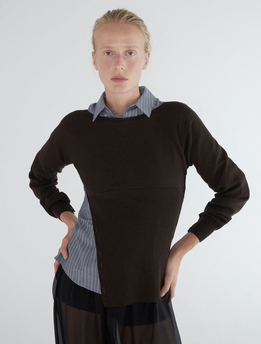 FA-Flat cross-shaped top with buttons along the sides and sleeves for ...