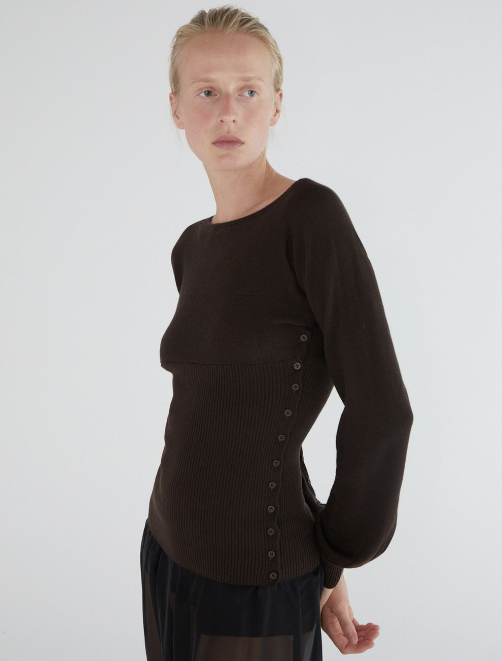FA-Flat cross-shaped top with buttons along the sides and sleeves for ...